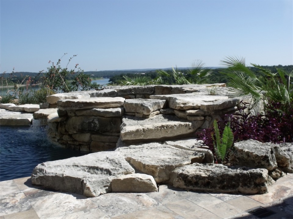 custom spa surrounded by planters - Spindler Construction - Austin ...
